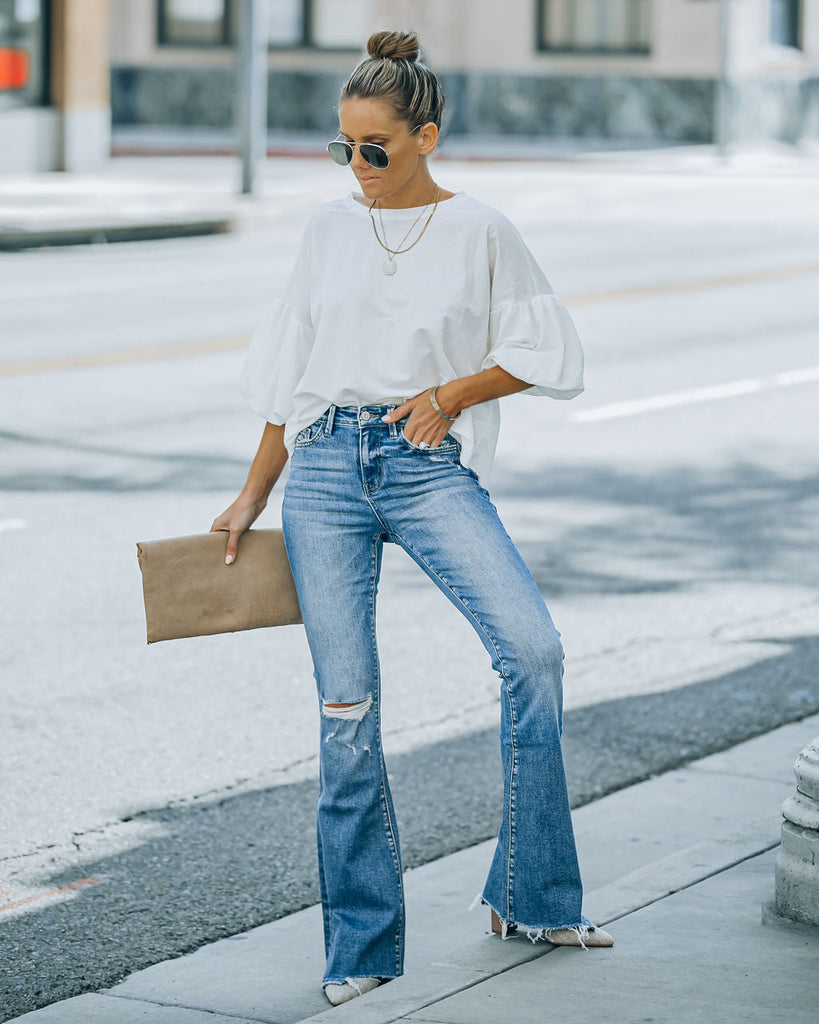 Offset High Rise Distressed Flare Denim
