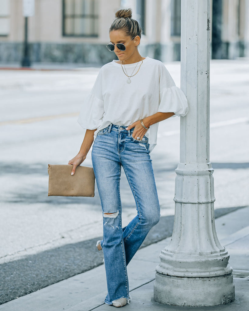 Offset High Rise Distressed Flare Denim